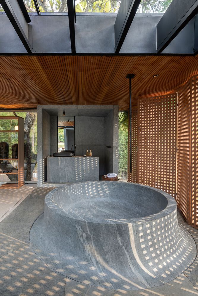 news: contemporary bungalow designed for a nature-immersive shower ...