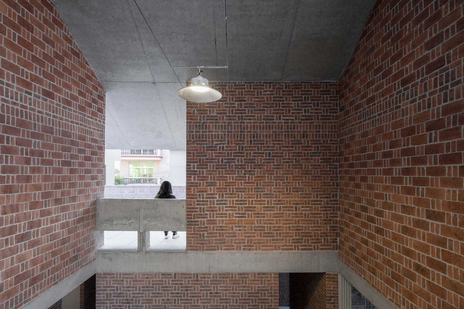 canton house hosts a serene interplay of bricks and concrete : project ...
