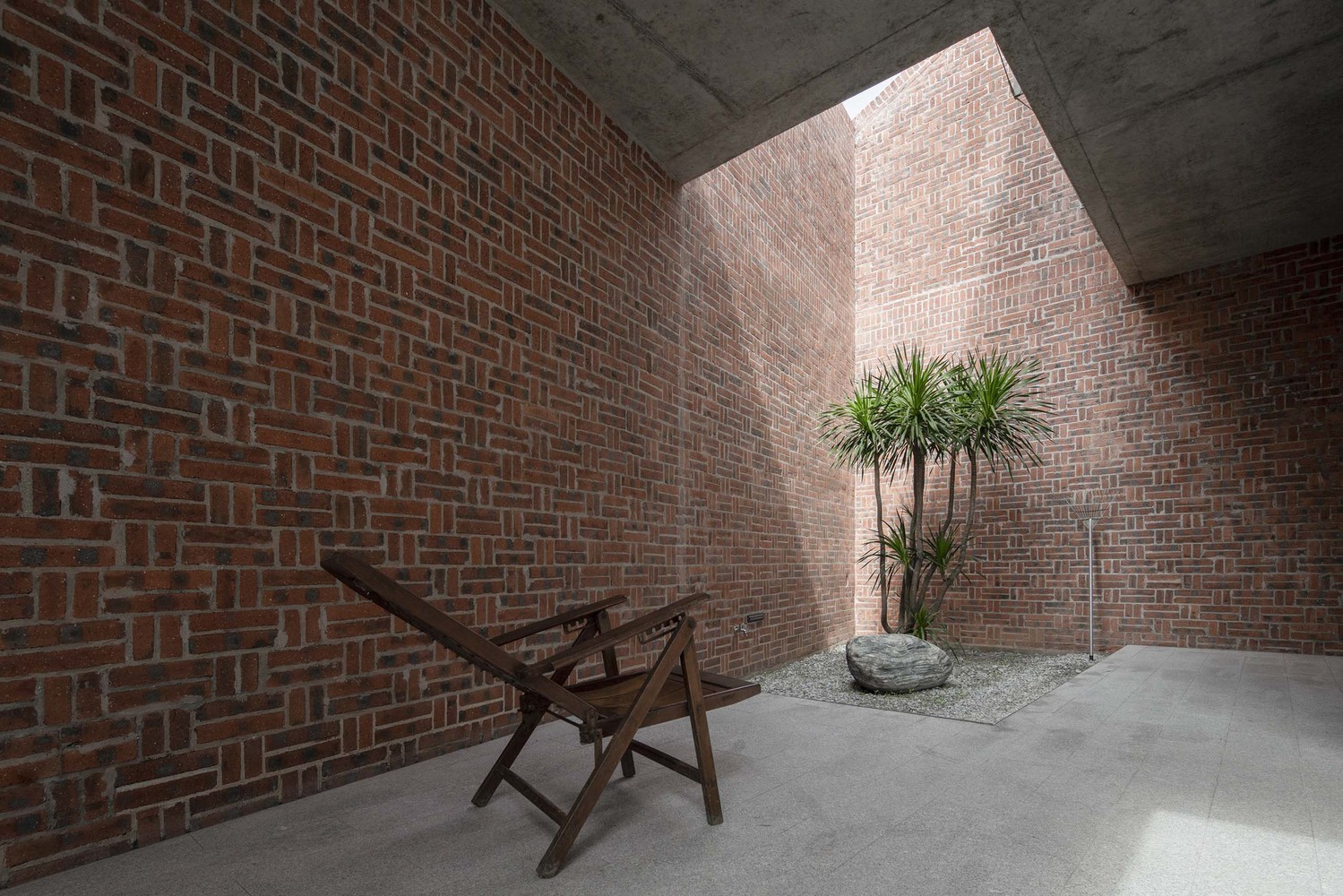canton house hosts a serene interplay of bricks and concrete : project ...