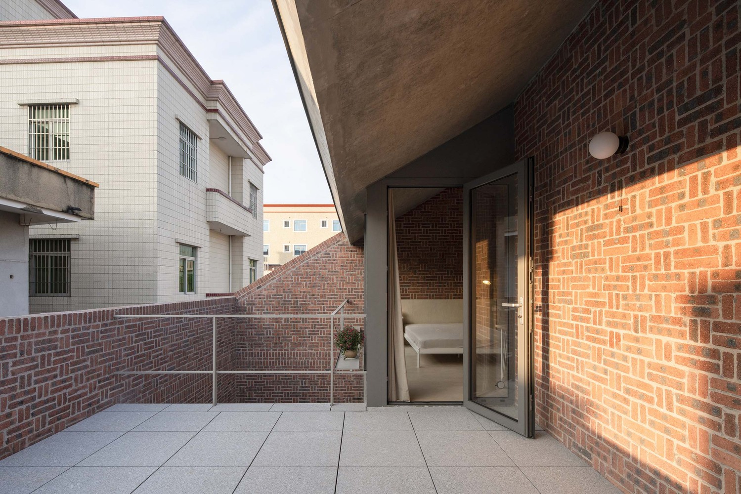 canton house hosts a serene interplay of bricks and concrete : project ...
