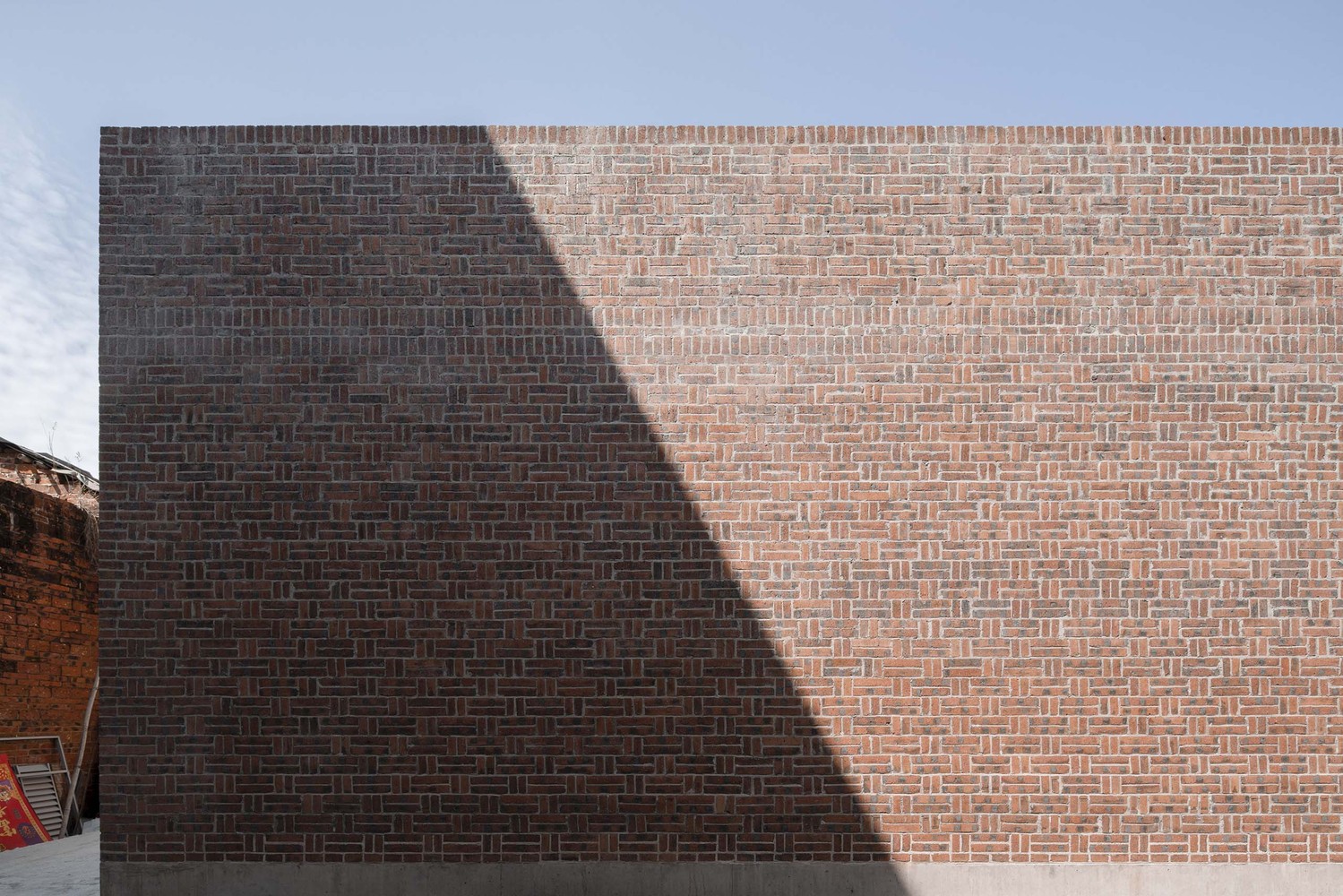 canton house hosts a serene interplay of bricks and concrete : project ...