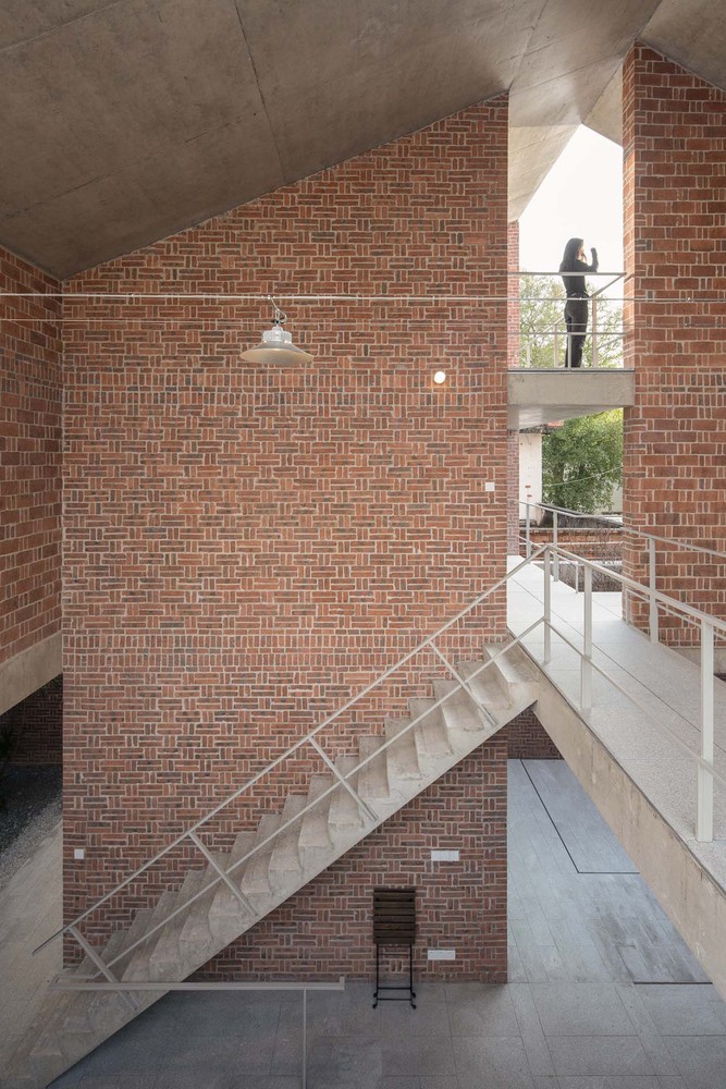 canton house hosts a serene interplay of bricks and concrete : project ...
