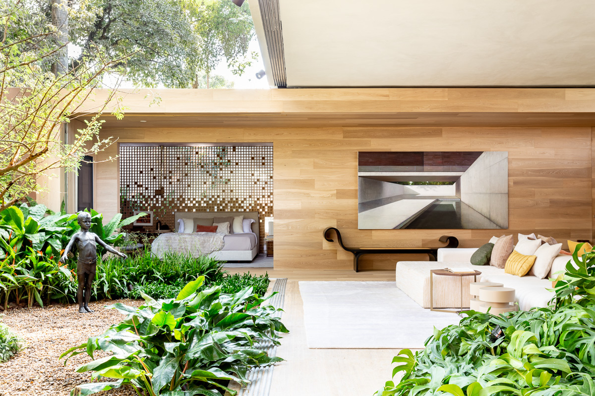 news: 7 contemporary home designs with indoor trees | the design story