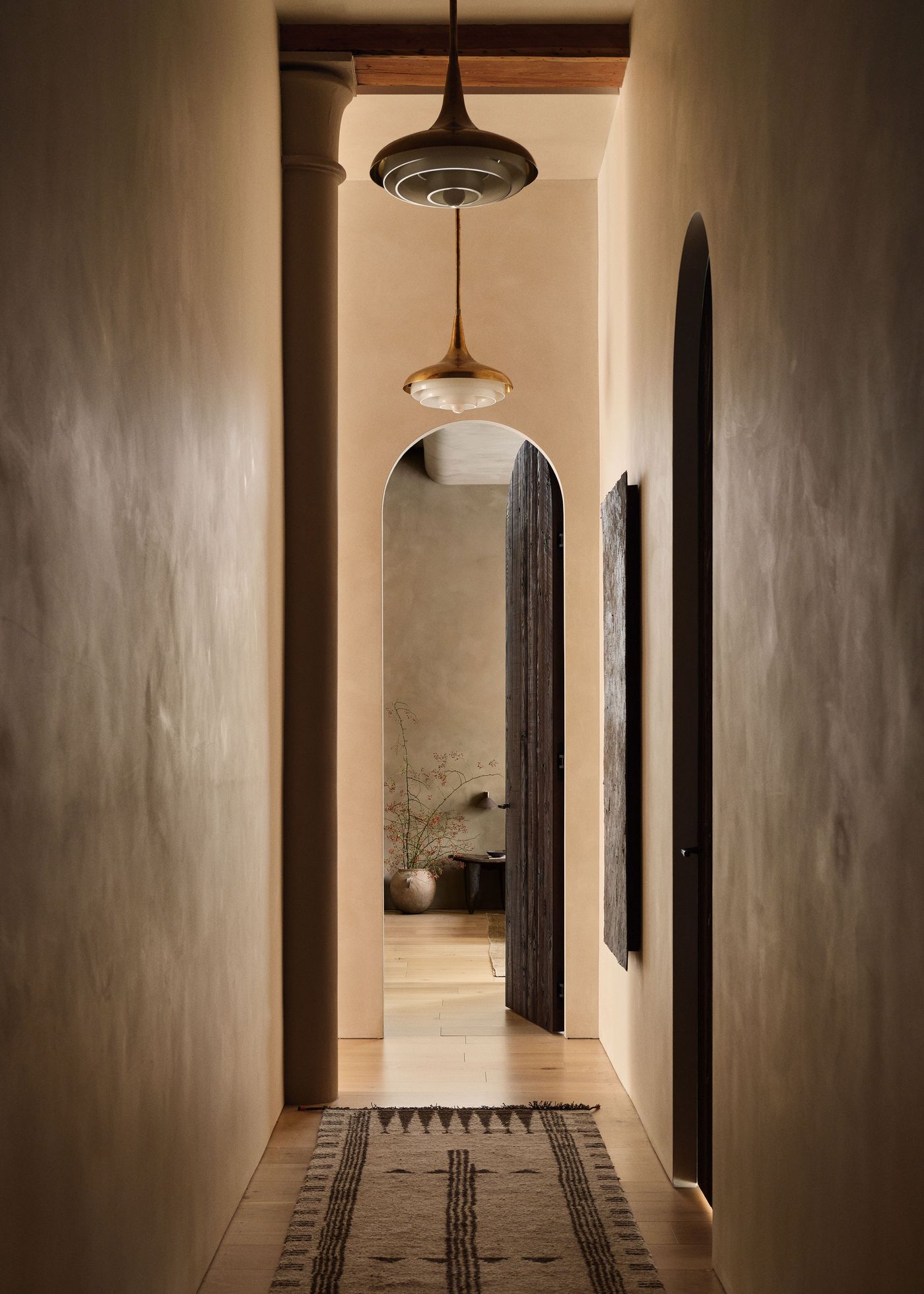ember studio renovates soho apartment with recycled arched wooden doors ...