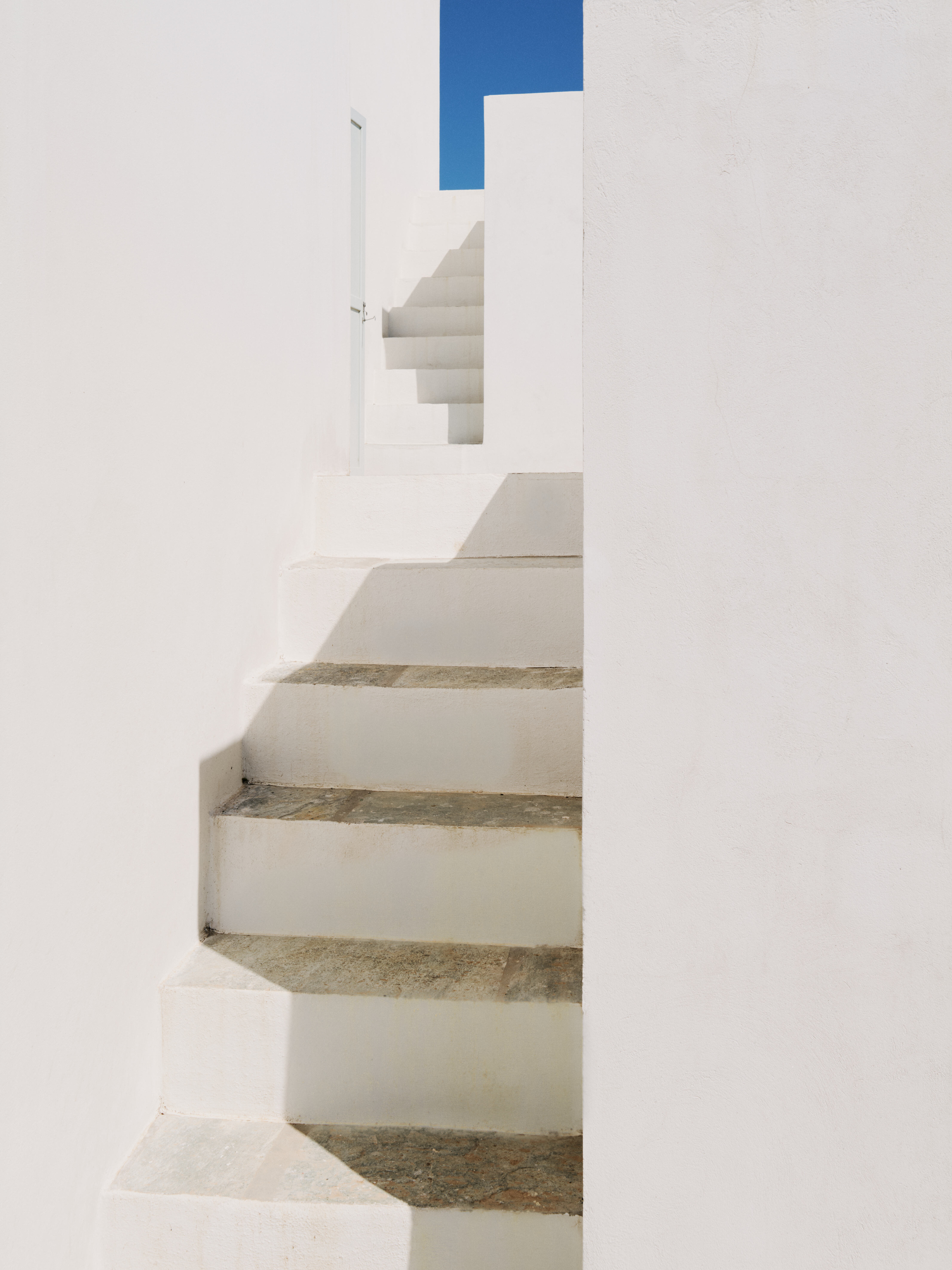piperi house utilizes white stacked cubes drawn by cycladic beauty ...