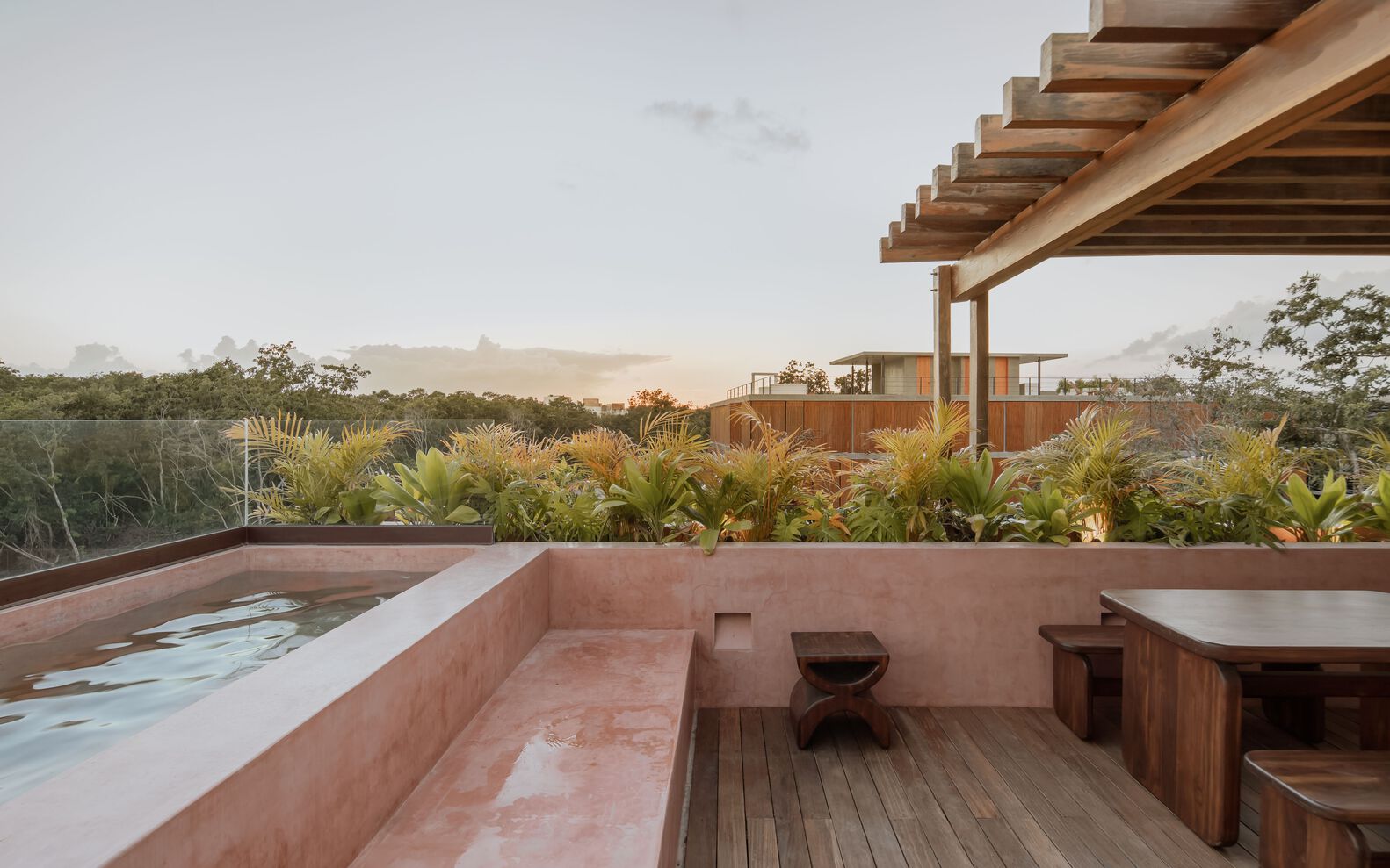 etorno tulum house is a tropical haven wrapped in serene terracotta ...