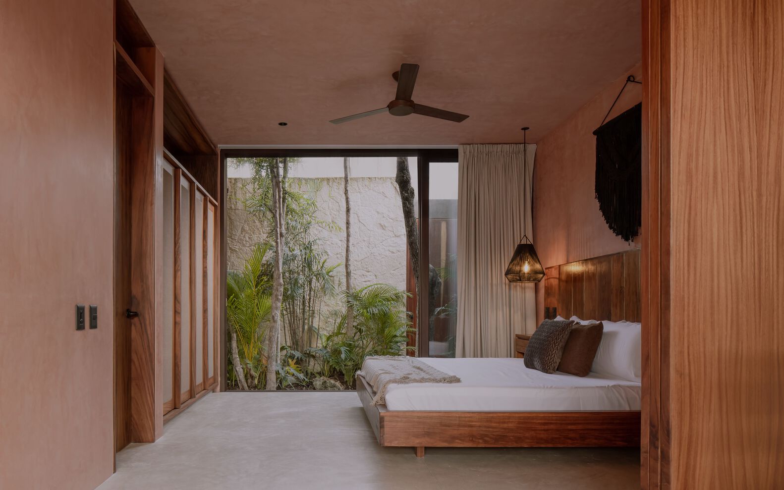 etorno tulum house is a tropical haven wrapped in serene terracotta ...