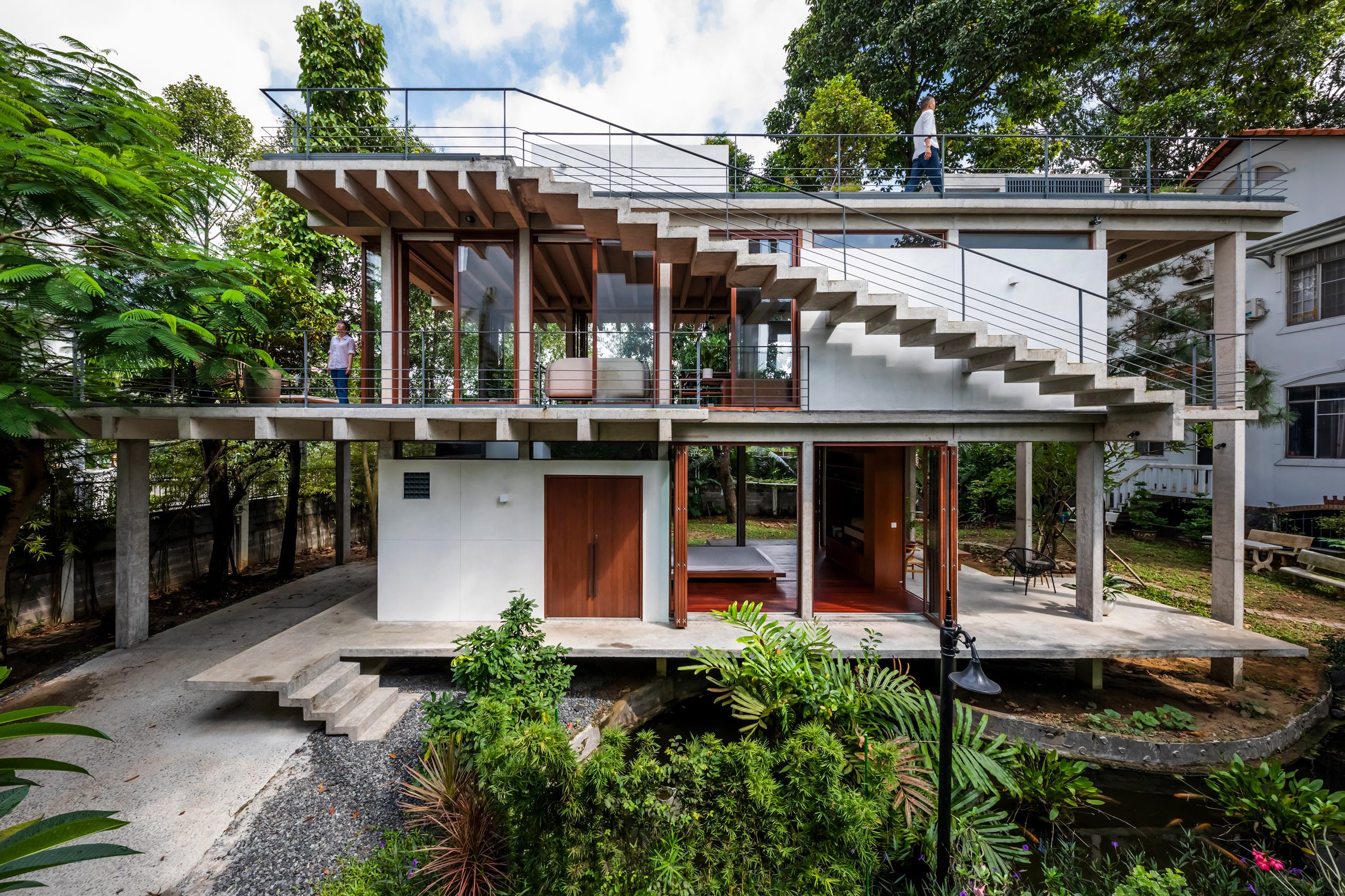sanuki daisuke architects completed a flood-resilient floating house ...
