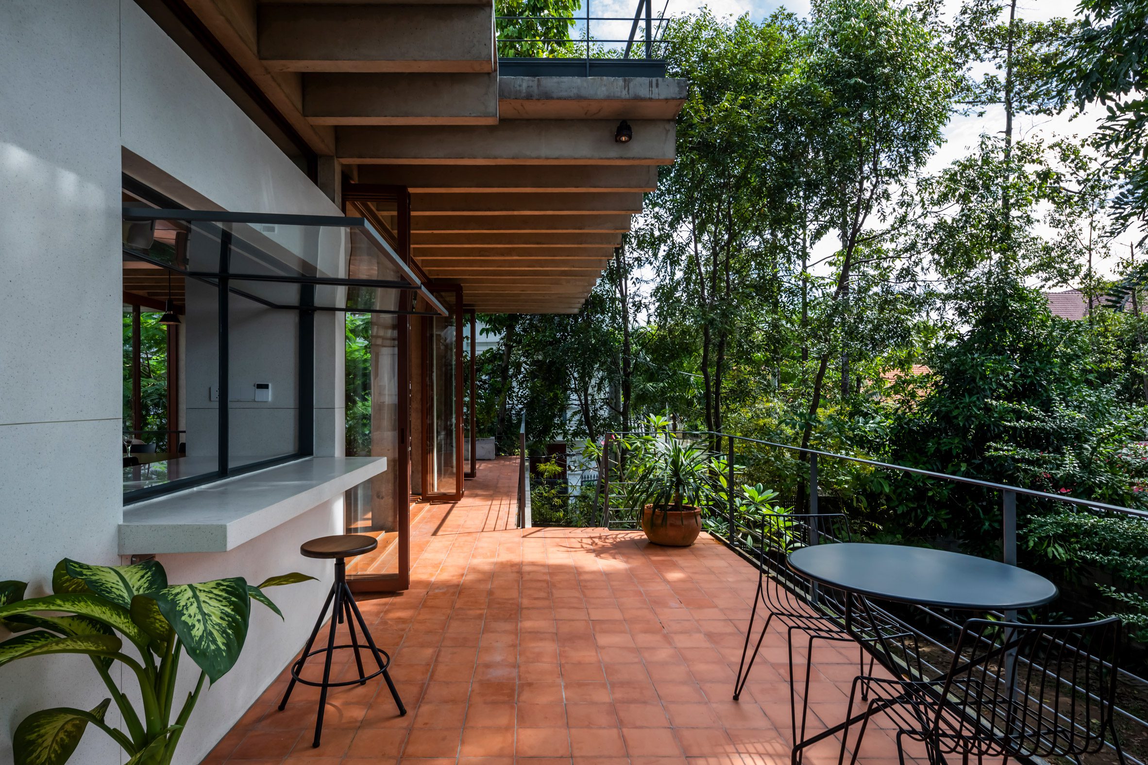 sanuki daisuke architects completed a flood-resilient floating house ...