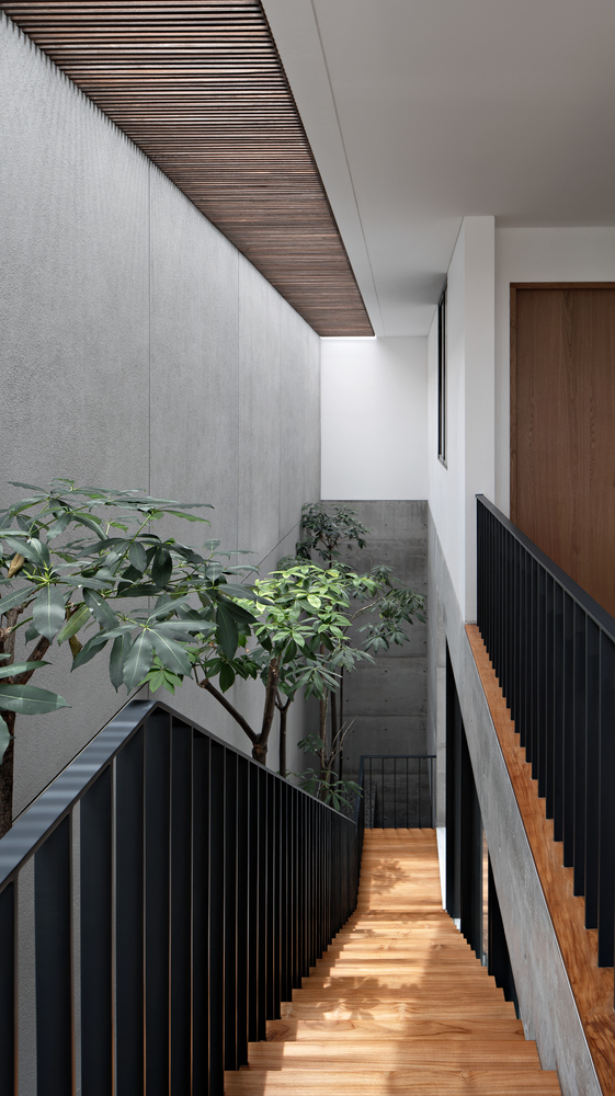 hideout house celebrates indoor-outdoor connection around a shallow ...