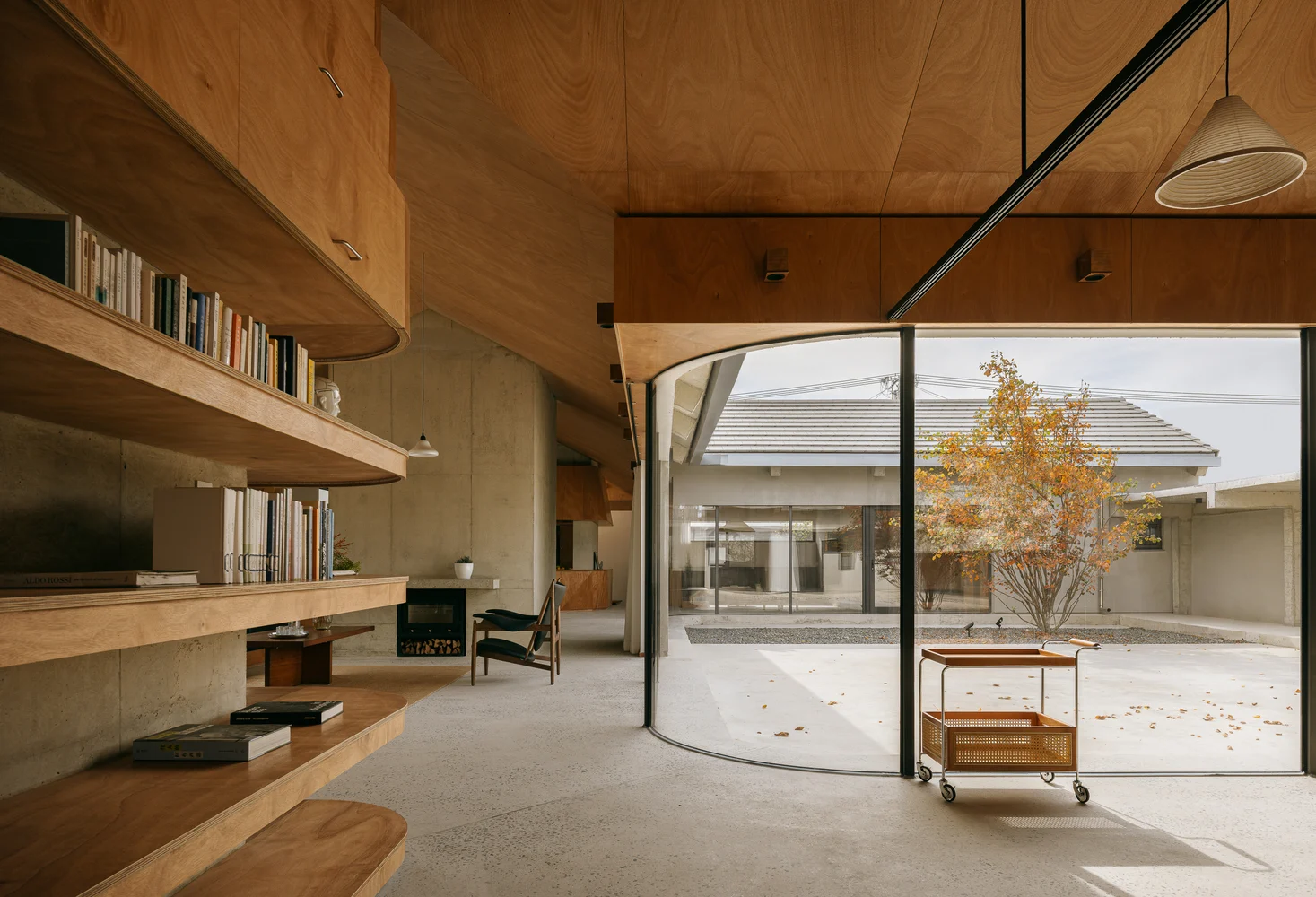 chaoffice completes cross-shaped multigenerational courtyard home in ...