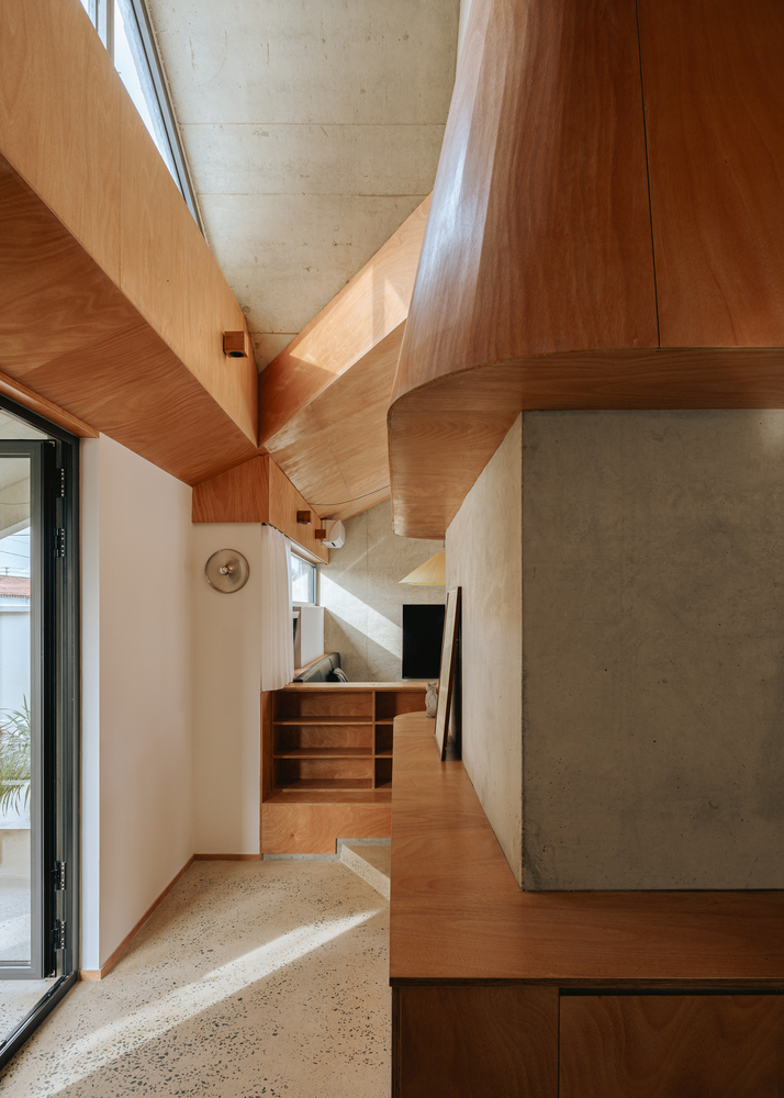 chaoffice completes cross-shaped multigenerational courtyard home in ...