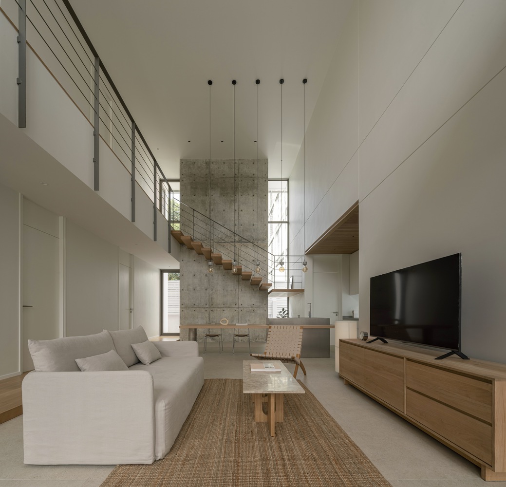 a house in thailand enclosed in massive concrete and minimalistic ...