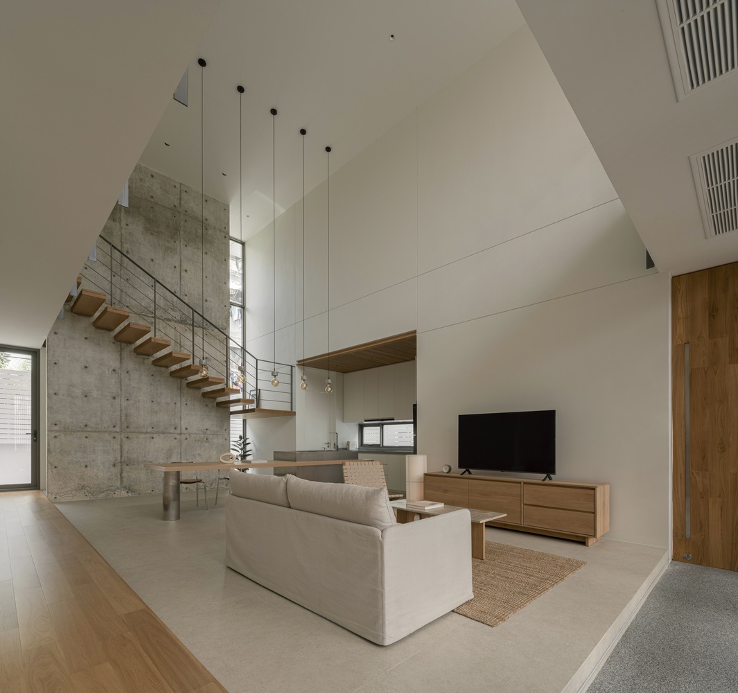 a house in thailand enclosed in massive concrete and minimalistic ...