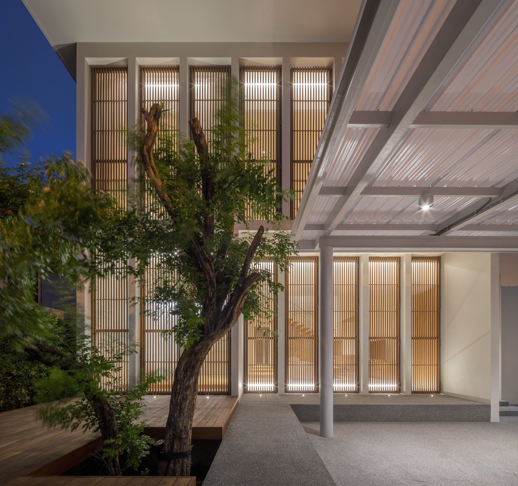 a house in thailand enclosed in massive concrete and minimalistic ...