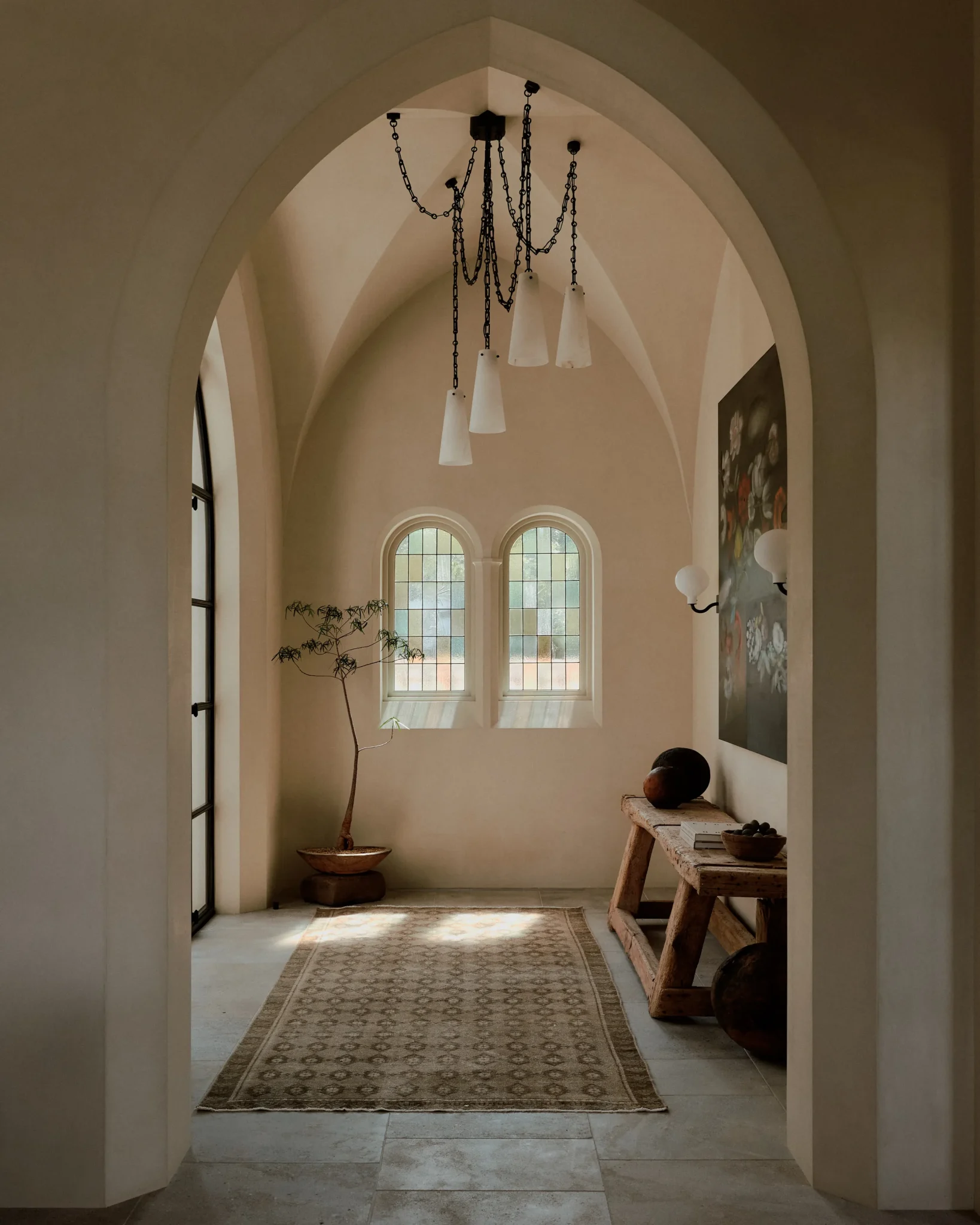 arches and rustic details define a modern mediterranean home in austin ...