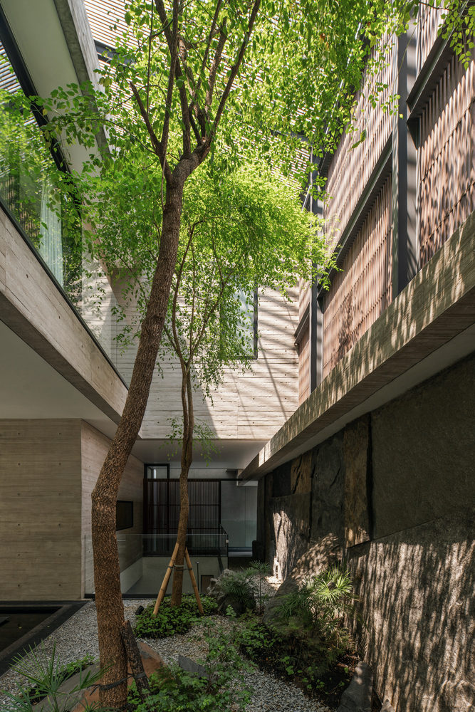 mitsugo house offers a quiet tropical refuge in the city: project by ...