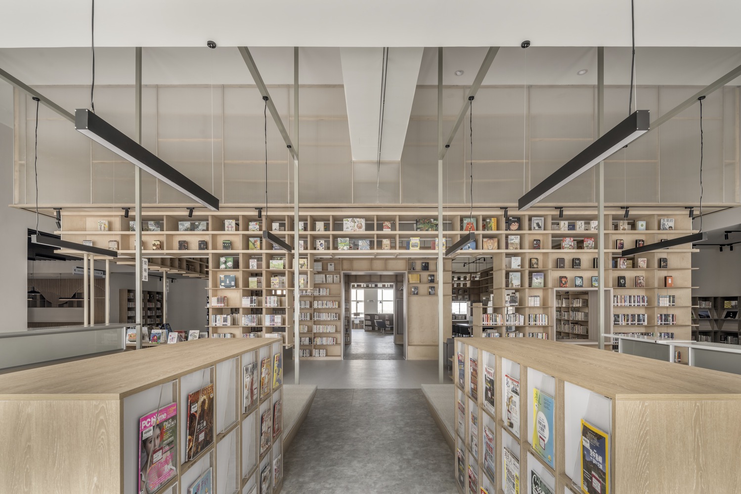 news: open layout and see-through book shelves for a kid-friendly ...