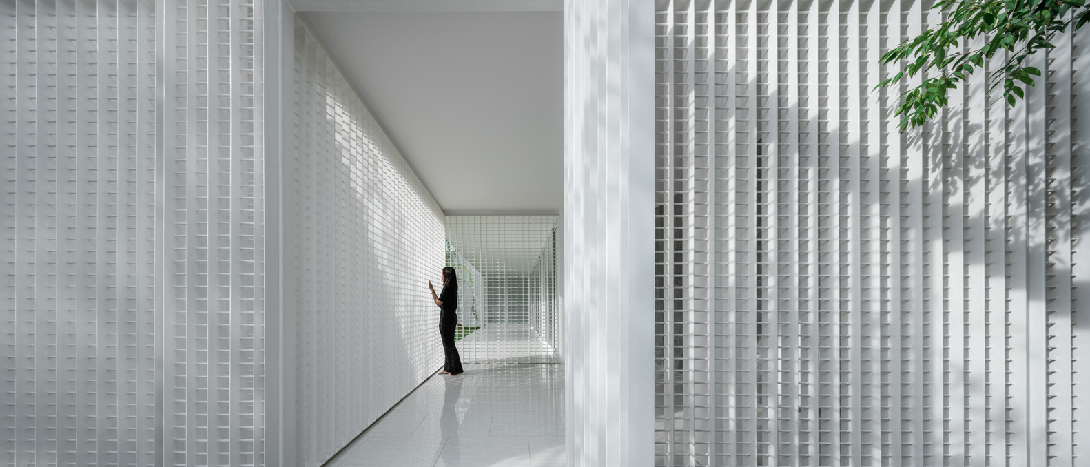 veil house sparks ethereality using translucent screens and courtyards ...